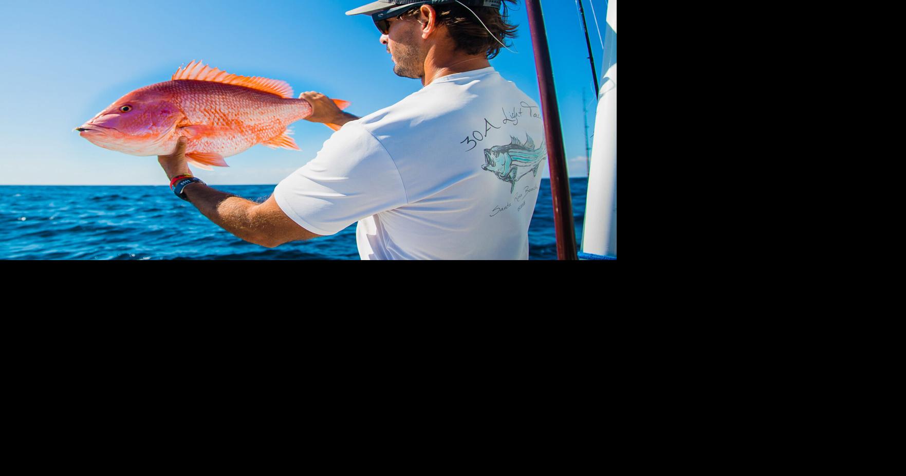 holding snapper | Fishing-cat | floridasportfishing.com