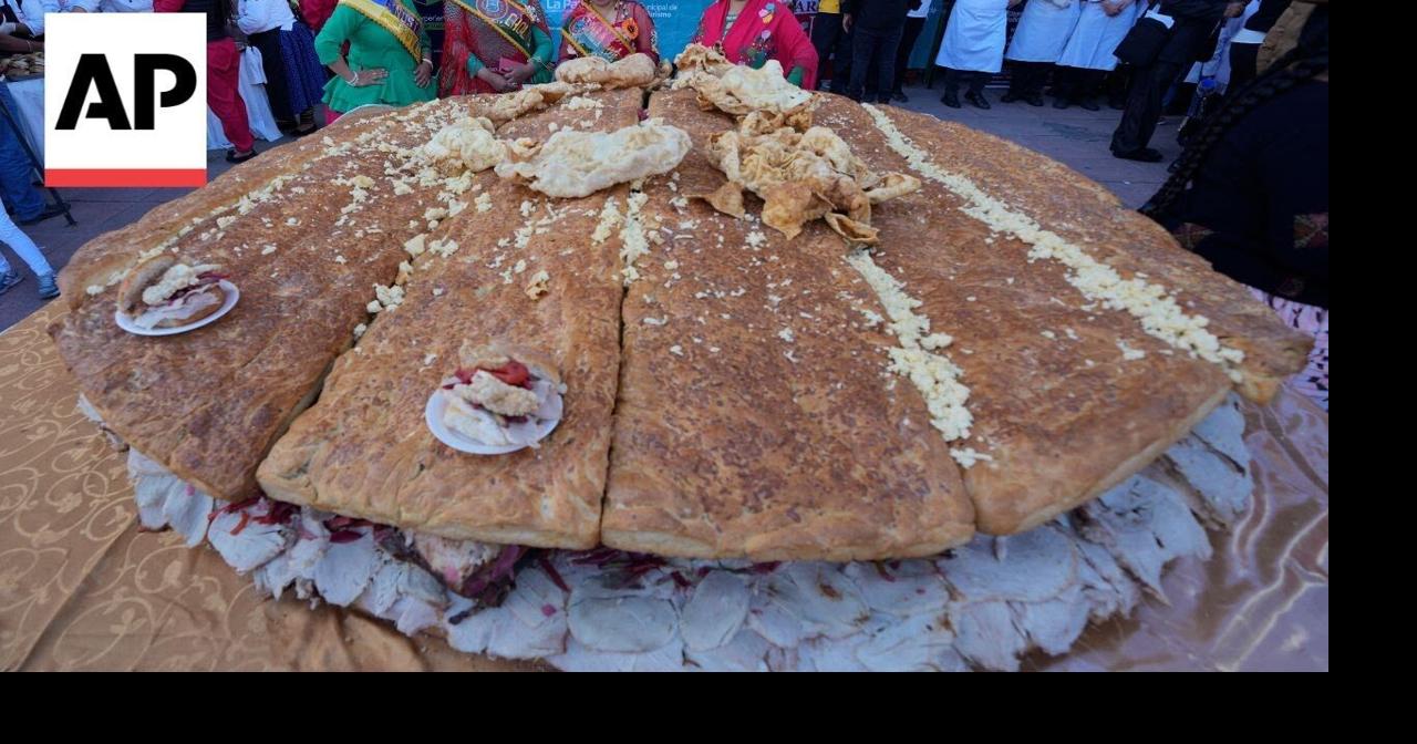 Chefs prepare giant 'Sandwich de Chola' in Bolivia in a bid to break ...