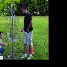 JUST 'FORE!' THE FUN OF IT: Disc golf course opens on shores of Seneca ...