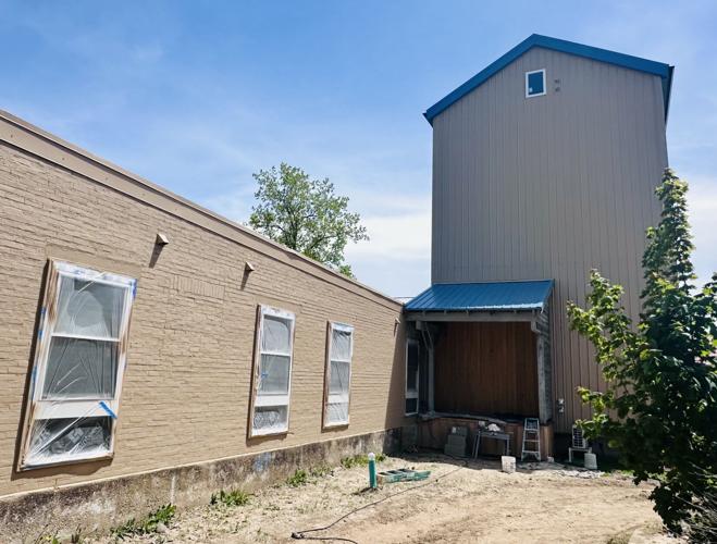 Geneva building renovation unveiled; formerly dilapidated building ...