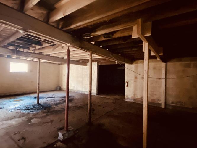 Geneva building renovation unveiled; formerly dilapidated building ...