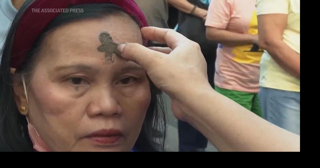 Catholics in the Philippines have their foreheads marked with ash ...