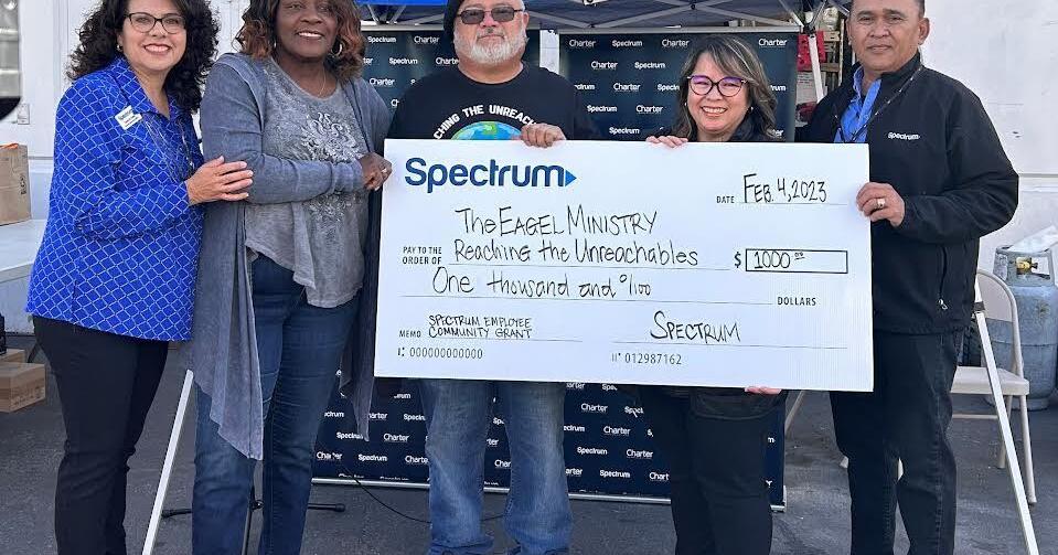 Spectrum donates funds to local food bank | Business ...