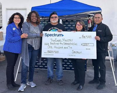 Spectrum donates funds to local food bank | Business ...