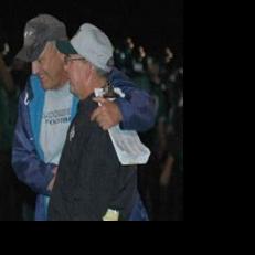 Bloomington coach, Don Markham, congratulates Kaiser caoch, Dick Bruich ...