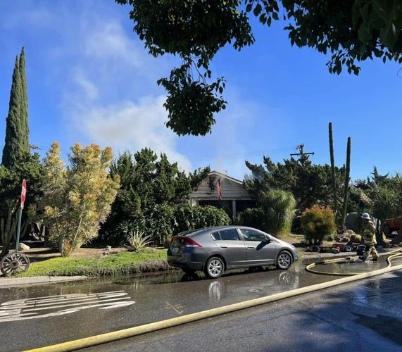 Two persons are rescued after being trapped inside burning house in ...