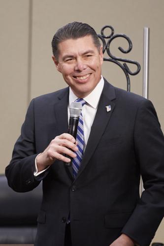 Returning member Jesse Sandoval and new member Peter Garcia are sworn ...