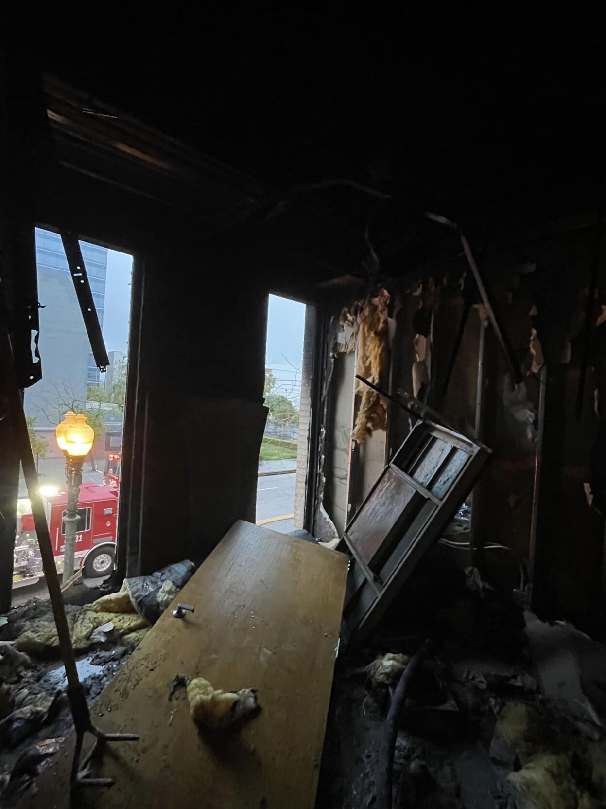 Firefighters rescue two people after fire damages vacant building in ...