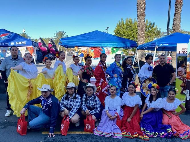 Students perform as Walmart store celebrates opening of new spring ...