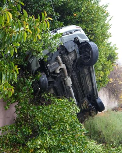Car crashes into light pole and comes to a complete stop sitting ...
