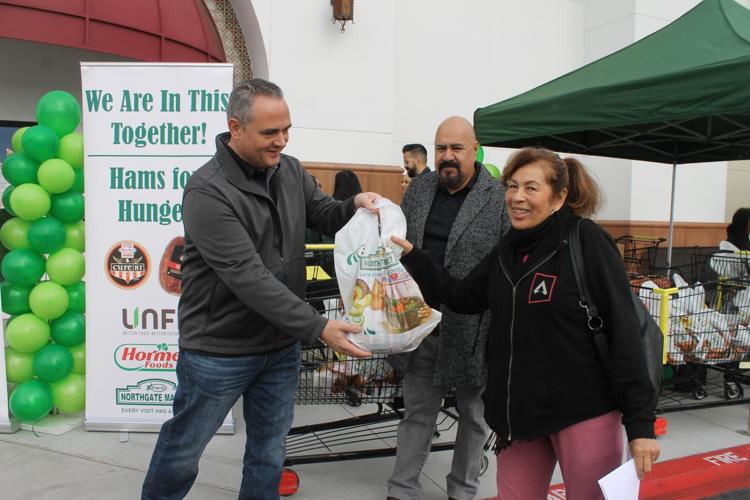 Northgate Gonzalez Market in Fontana gives away 1,500 six-pound hams to ...