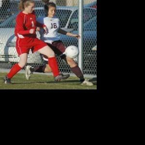 Miller's Mistie James and Fontana's Ruby Leon race down the sideline ...