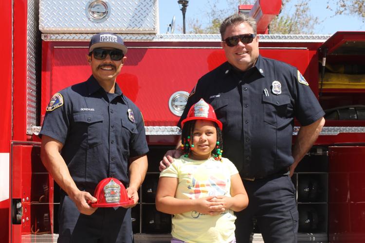 Families enjoy New Book Festival at Lewis Library in Fontana; see ...