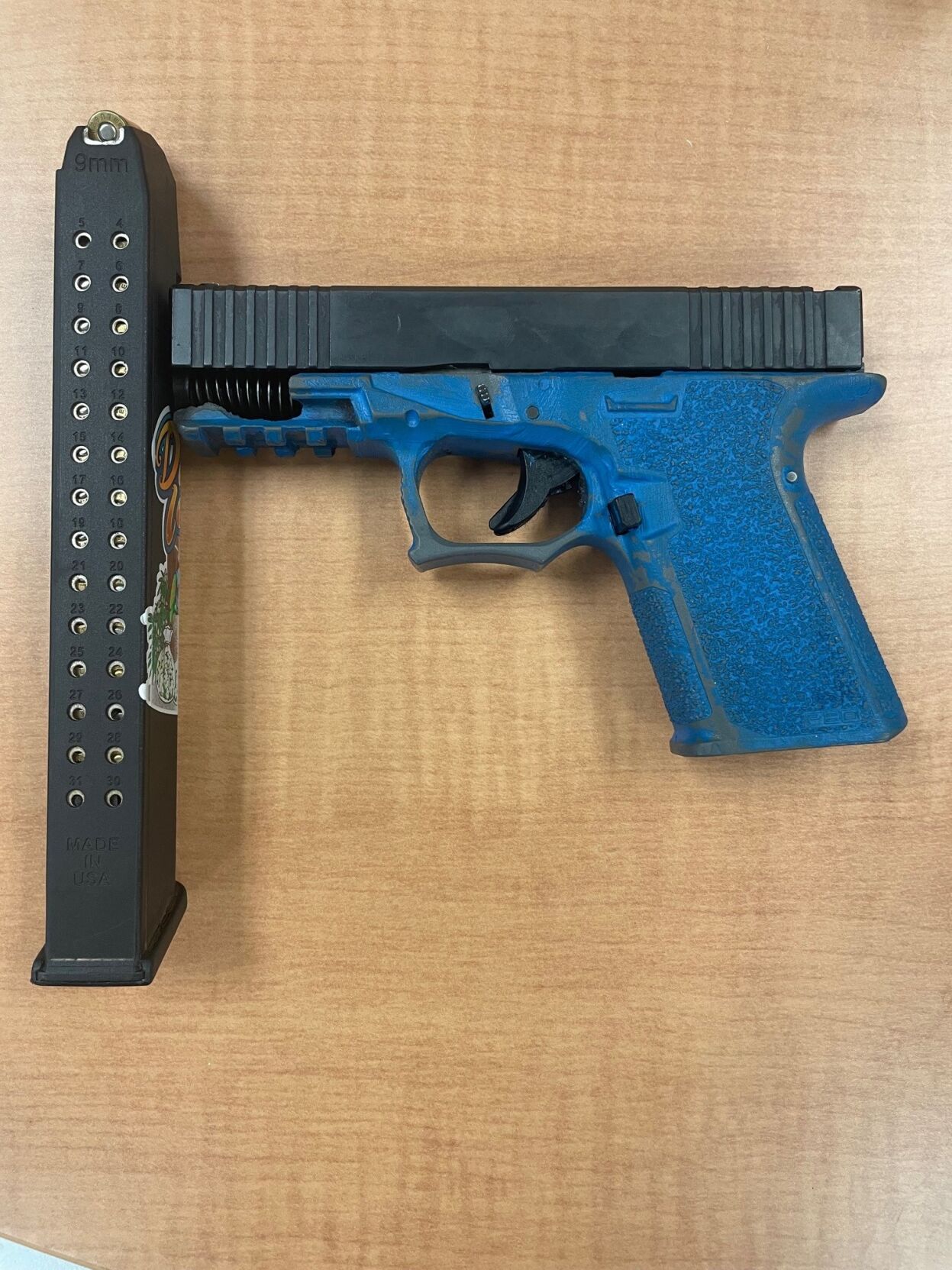 Heavy jacket and ski mask draw attention to felon concealing loaded ...