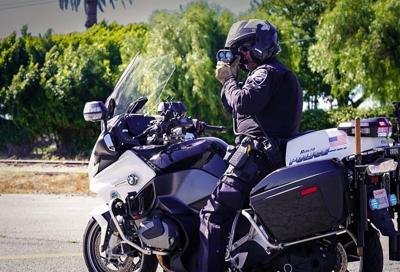 Two suspects are arrested on charges of street racing and reckless ...