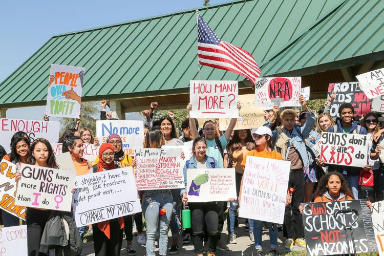 Students walk out of classrooms to take a stand against gun violence ...