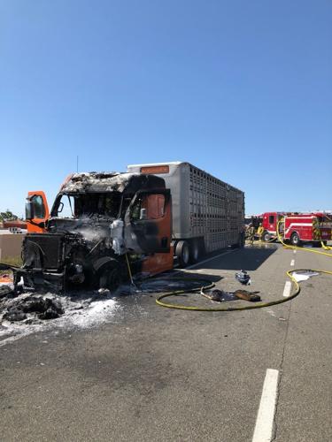 Firefighters extinguish fire which burned tractor trailer and saved 50 ...