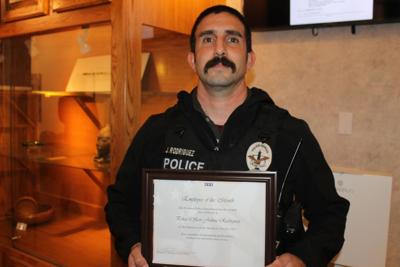 Officer Joshua Rodriguez is honored for his work in stopping alleged ...
