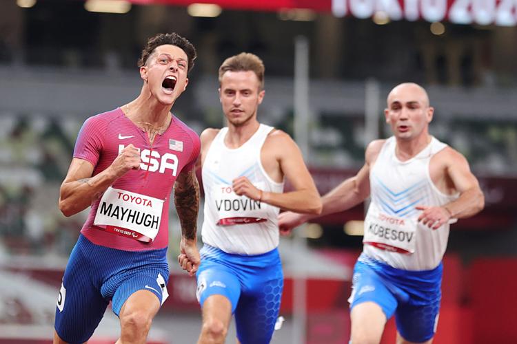 Photos: Paralympic sprinter Nick Mayhugh wins gold, sets world record ...