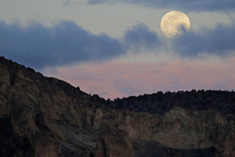 Photos: February super snow moon lights up the night sky ...