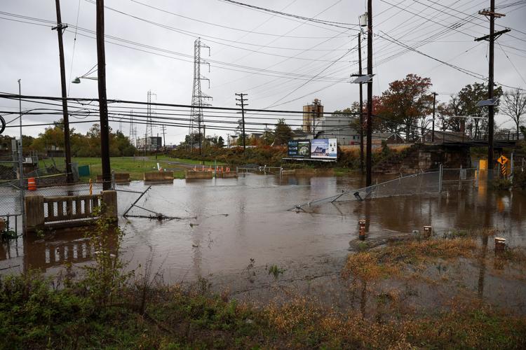 Photos: New England surveys damage in Nor'easter's aftermath ...