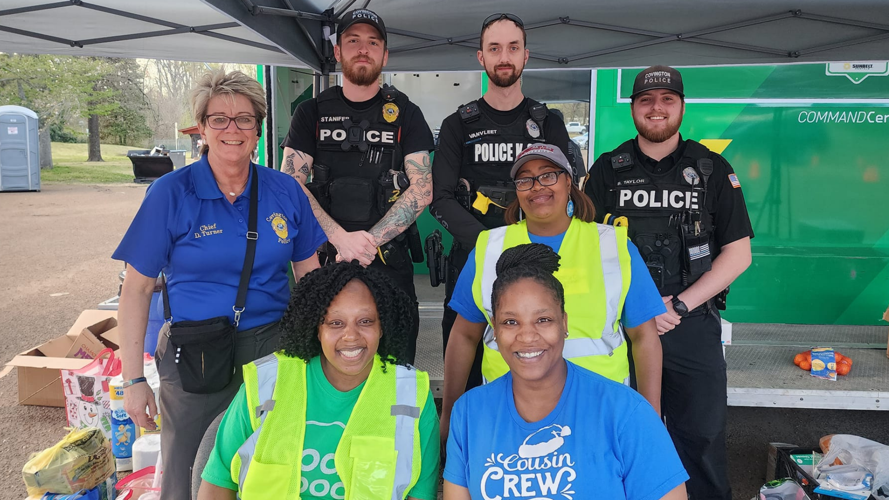PHOTOS: Volunteers key emergency supply distributions after storms hit ...