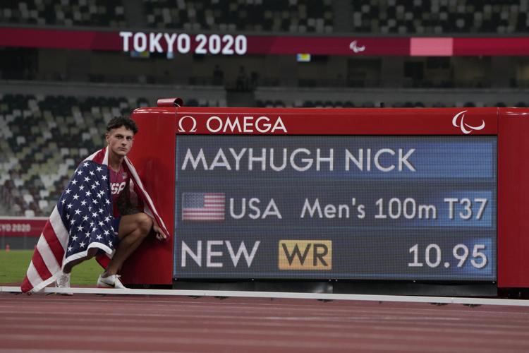 Photos: Paralympic sprinter Nick Mayhugh wins gold, sets world record ...