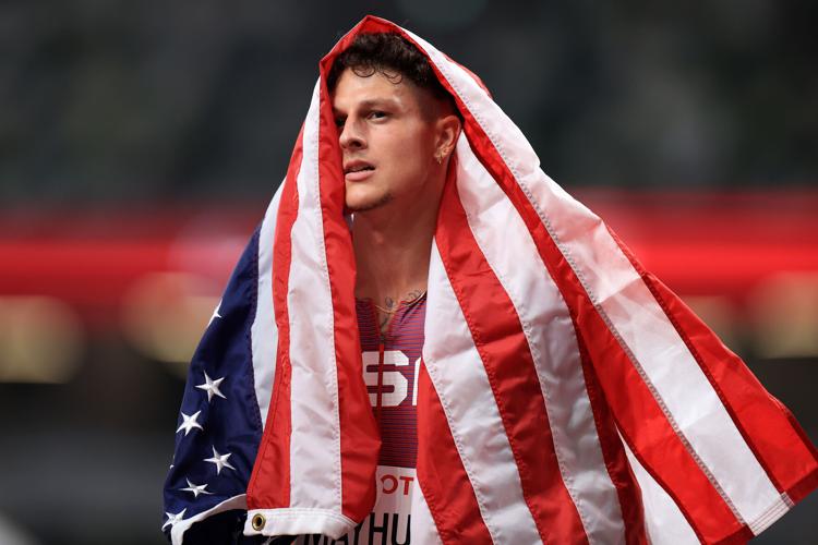 Photos: Paralympic sprinter Nick Mayhugh wins gold, sets world record ...