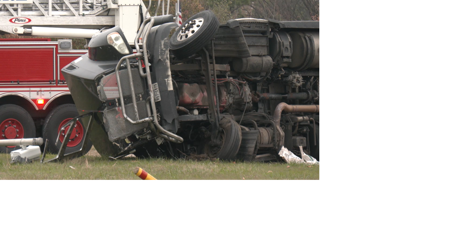 Tractor-trailer overturns after two-vehicle crash | News | fox13memphis.com