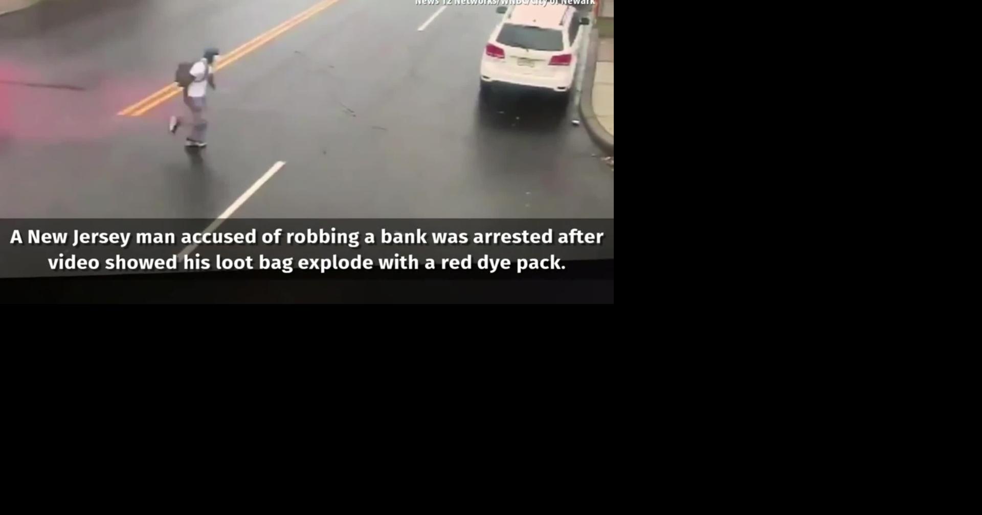 Bank robber caught ‘red-handed’ days after dye pack explodes during ...