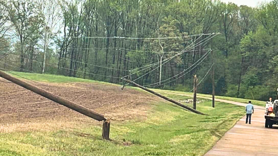 PHOTOS: Storms push down utility poles and trees in Fayette County ...