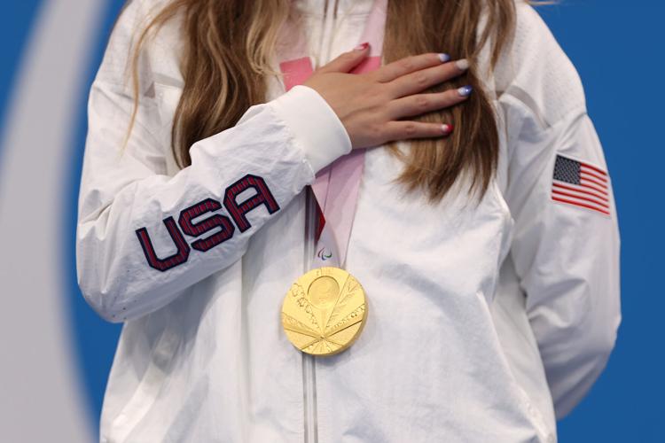 Photos: Swimmer Gia Pergolini wins Paralympic gold, breaks world record ...