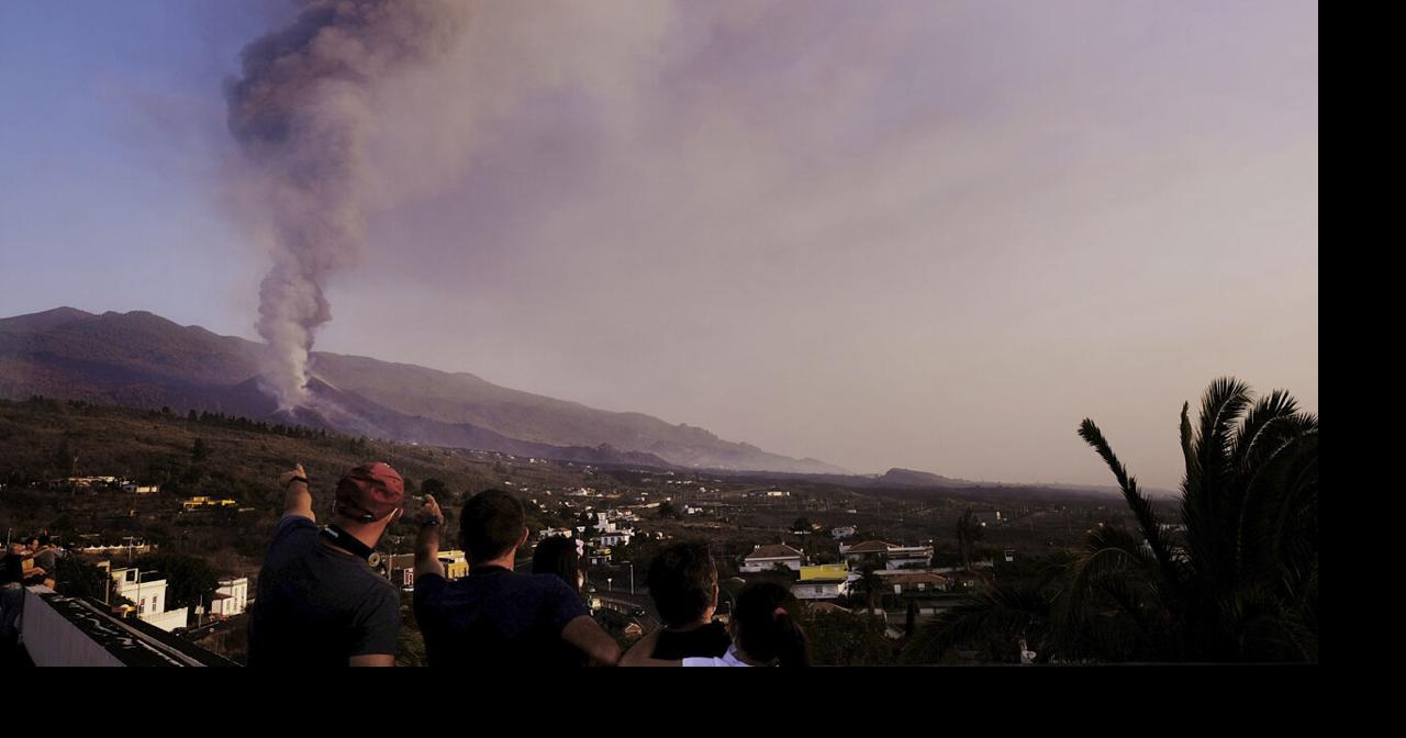 Photos: Lava from Spanish volcano surges after crater collapse ...