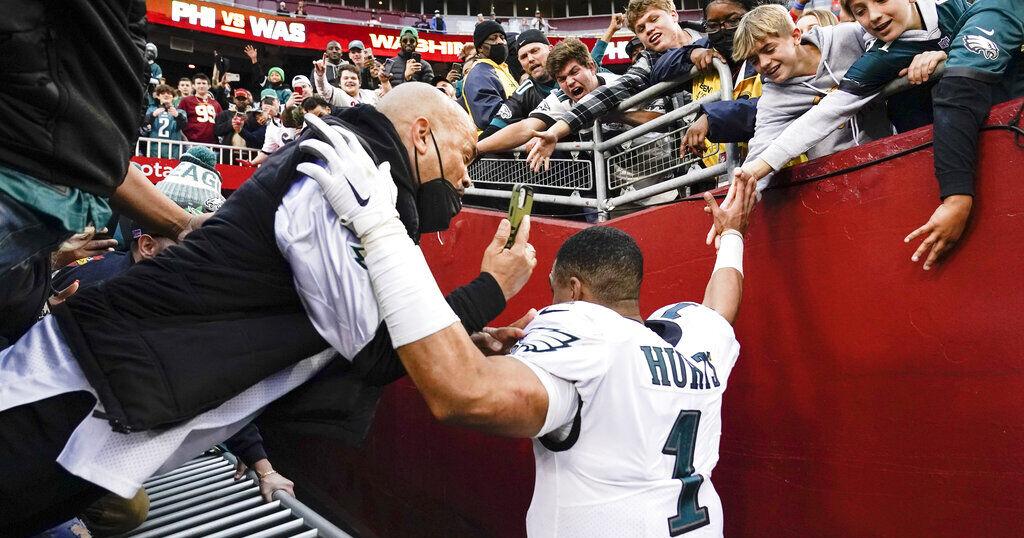 Photos: Railing collapses at FedEx Field sending fans falling ...