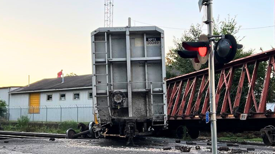 PHOTOS: Train's derailment leaves boxcars off the tracks, blocks ...