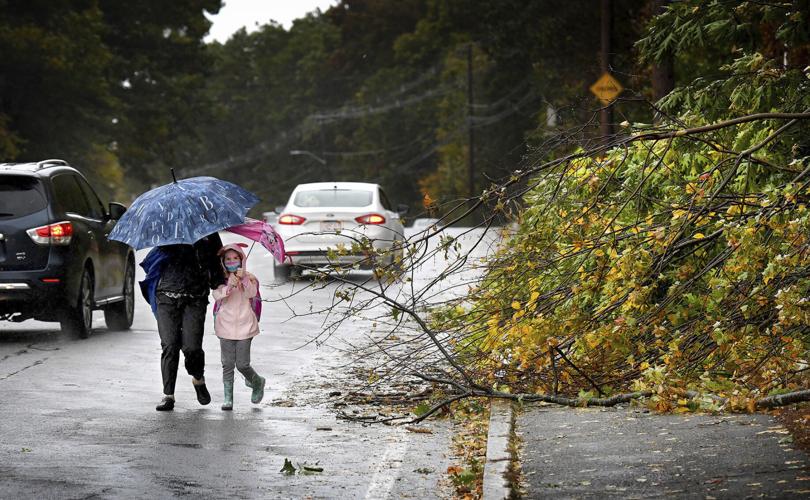 Photos: New England surveys damage in Nor'easter's aftermath ...