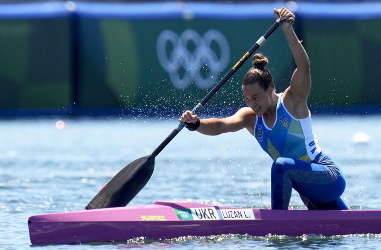 Photos: Nevin Harrison wins Olympic gold in 200-meter canoe sprint ...