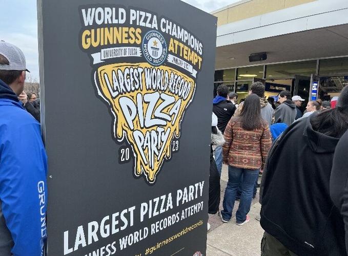 Photos: World record for largest pizza party set at TU basketball game ...