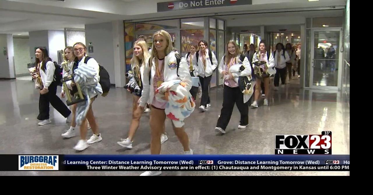 Families welcome home local cheerleading teams after winning UCA ...