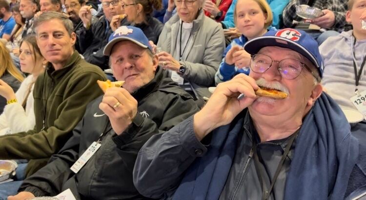 Photos: World record for largest pizza party set at TU basketball game ...