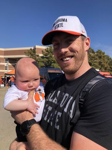 Former OSU football player Blake Jarwin brings 5-month old son Beckham ...