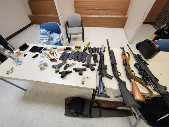 Man arrested after police find guns, alcohol and drugs during traffic ...