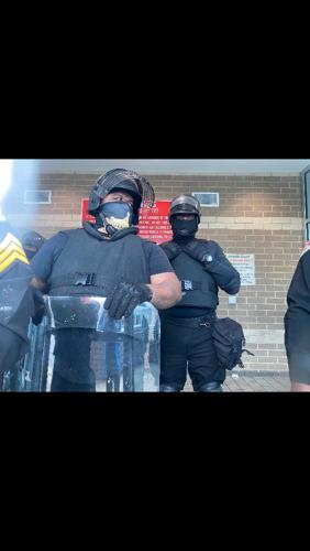 PHOTOS: Protesters gather outside 201 Poplar | | fox23.com