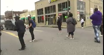 PHOTOS: Protesters gather outside 201 Poplar | | fox23.com