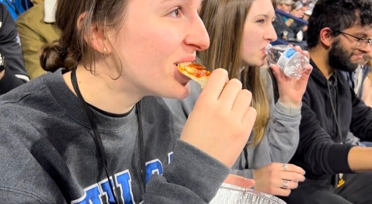 Photos: World record for largest pizza party set at TU basketball game ...