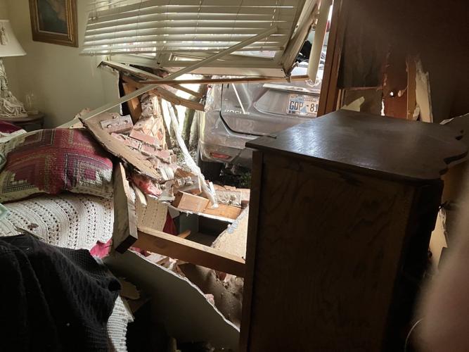 SUV backs into east Tulsa home | | fox23.com