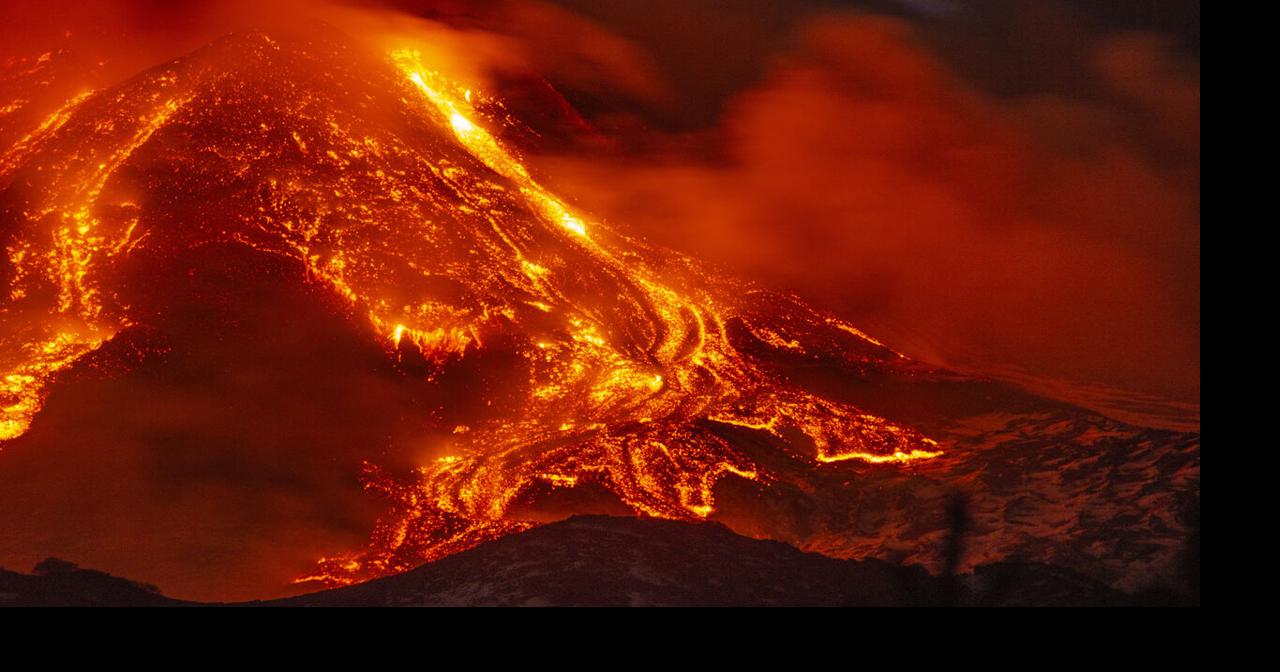 Photos: Italy's Mount Etna volcano erupts, shooting lava, ash into ...