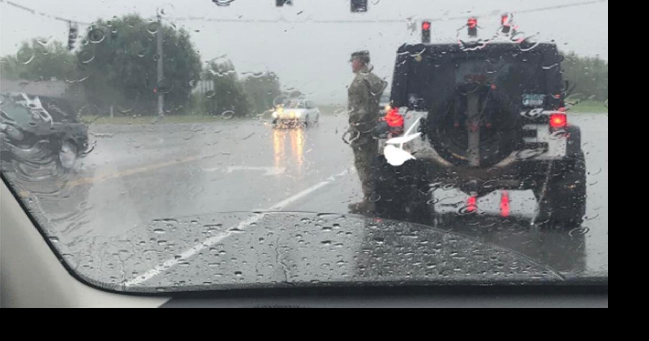 Soldier who saluted stranger's funeral procession in viral photo ...