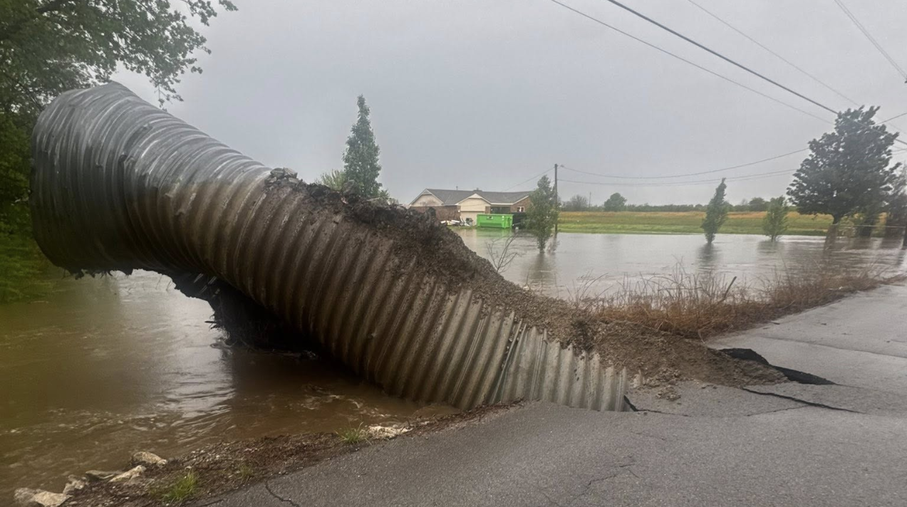 Section of 289th E Ave closed, homes evacuated after dislodged culvert ...