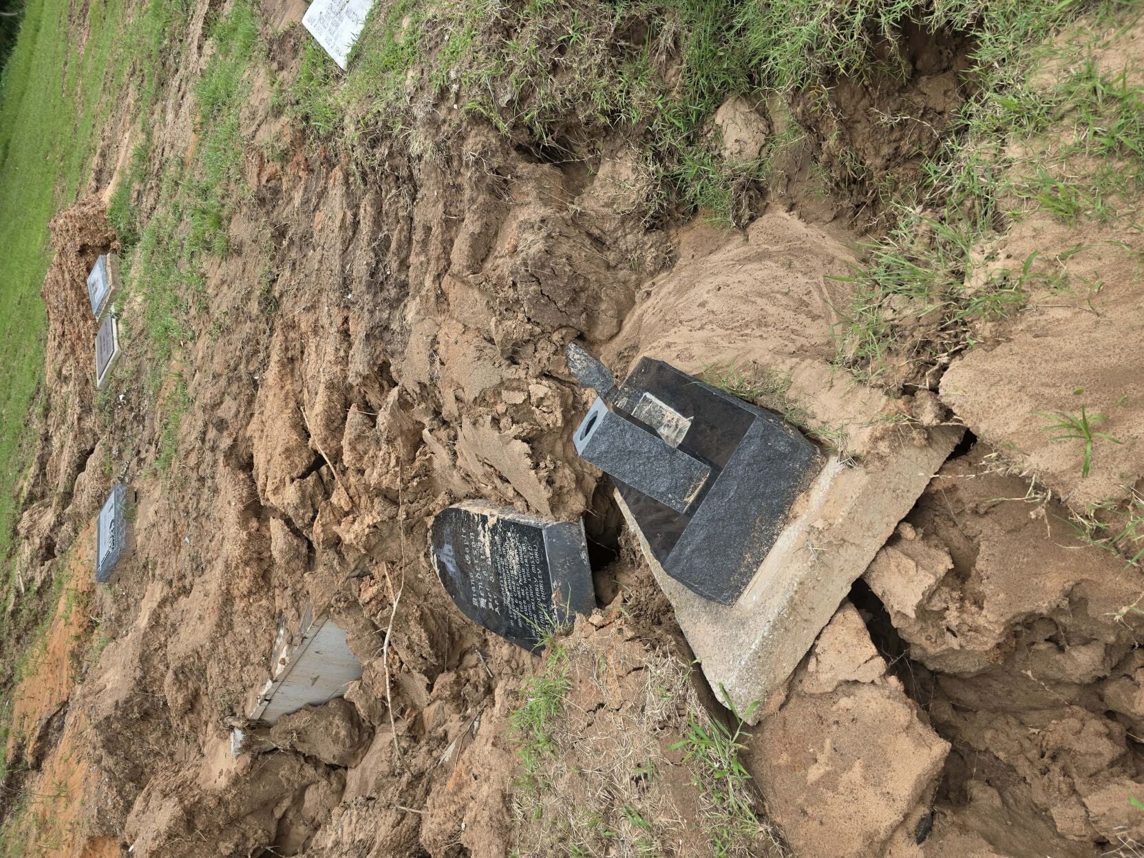 Heavy rains damage section of Sand Springs cemetery | News | fox23.com